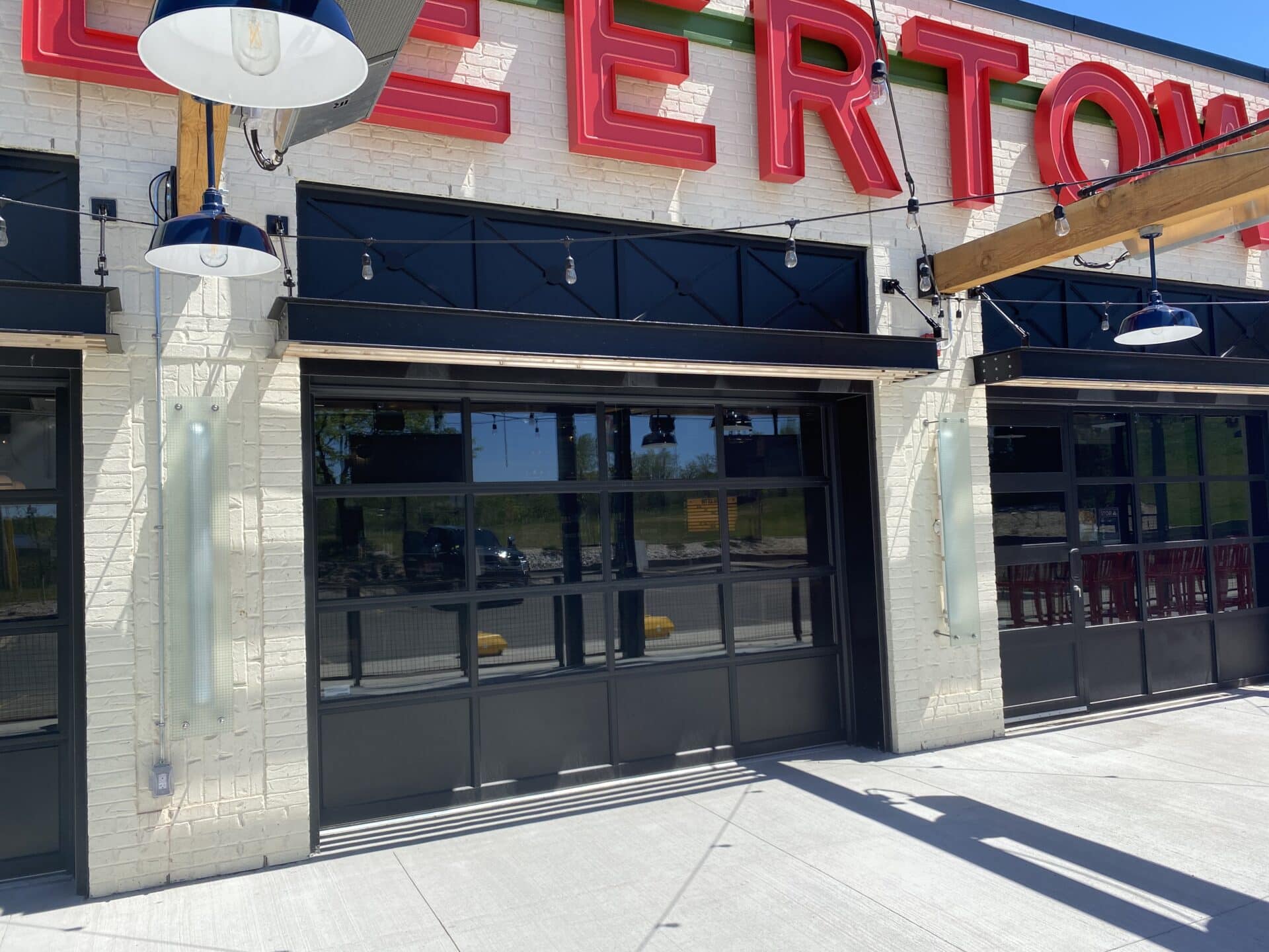 Transform Your Restaurant Patio with a Garage Door Upgrade